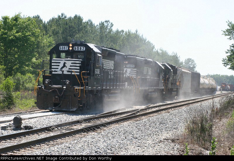 NS 6082 is lead in 3unit McIntyre Switcher pushing 48 loaded covered hoppers and tanks on 5-20-60